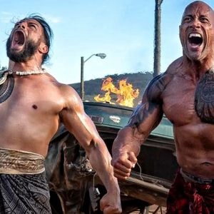 Watch: The Rock Recalls Roman Reigns Knocking Out a Cameraman While ...