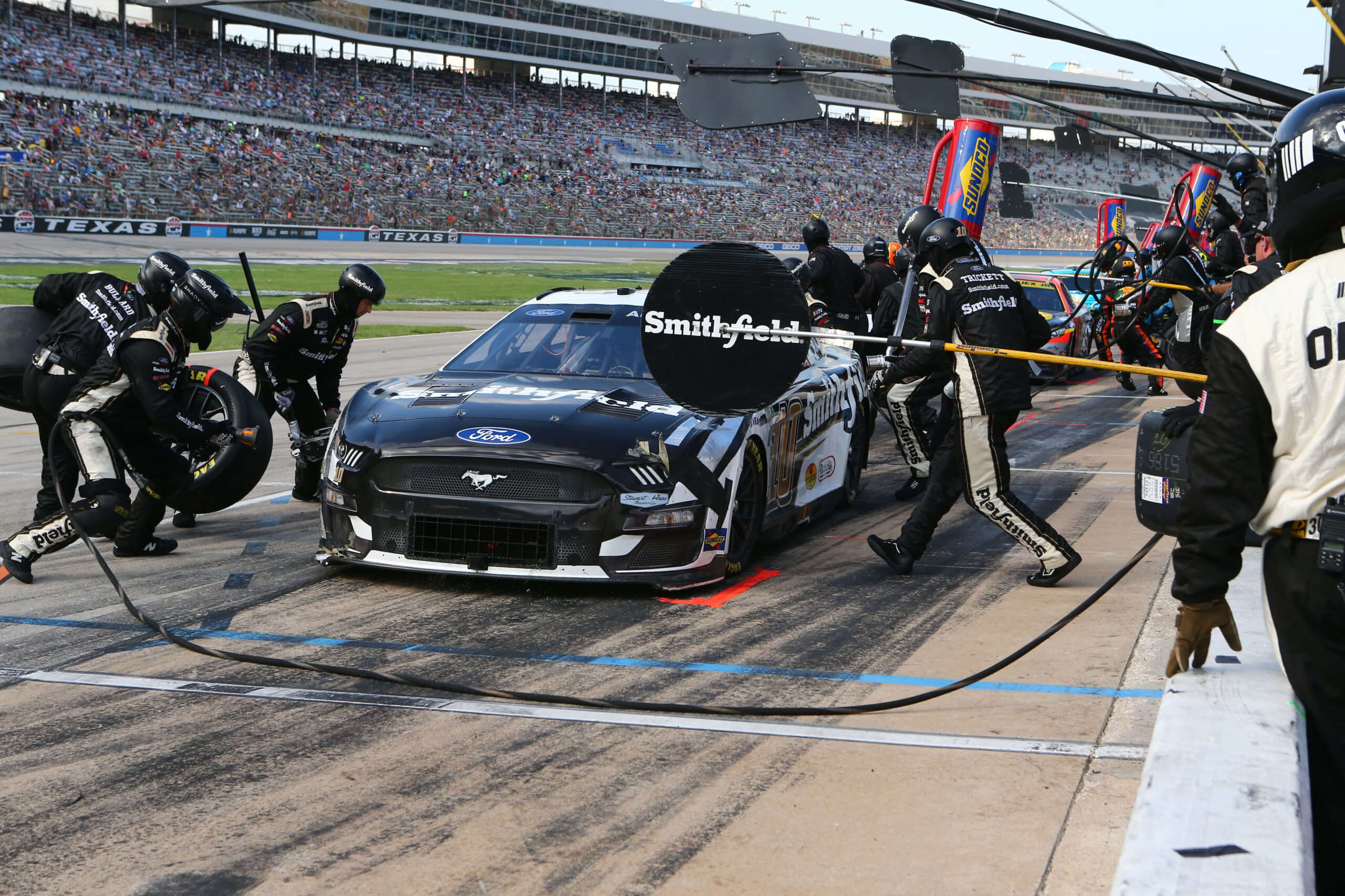How Does a NASCAR Driver Know When to Stop in the Pit Box? - The SportsRush